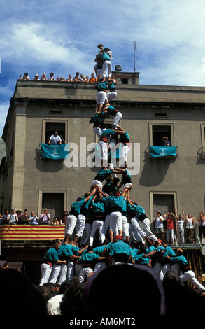 Castellers - catalonian tradition of building human towers -, Caldes de ...