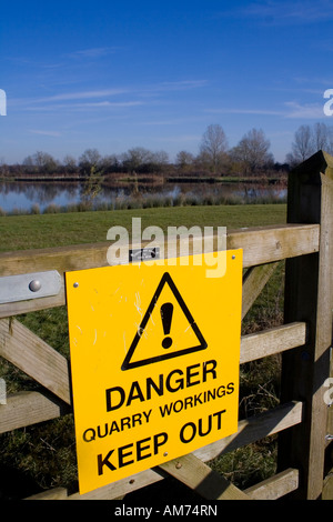 Sign warning "Danger. Quarry Works. Deep Excavations. Blasting ...