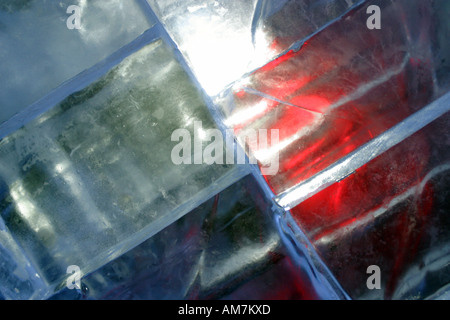 ICE frozen with red ligh shining through Stock Photo - Alamy