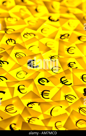 Paper yellow symbols of euro currency on blue background. View from ...