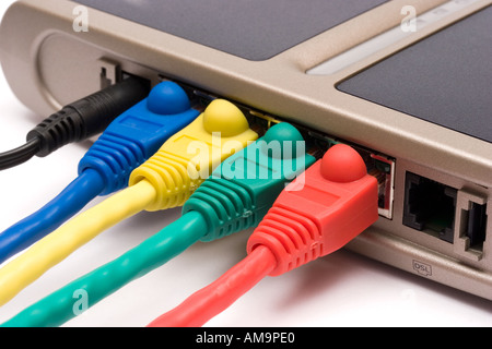 Ethernet cables plugged into router against white background Stock ...