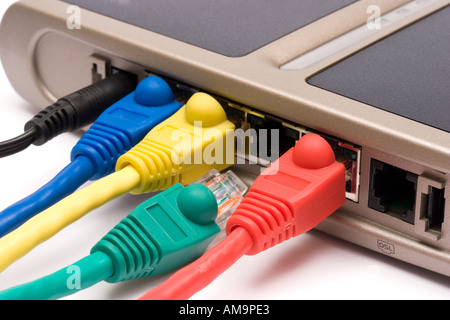 Ethernet cables plugged into router against white background Stock ...