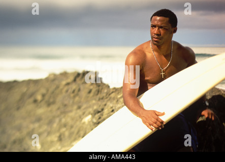 Derrick Mayes Football Player with his surfboard Stock Photo - Alamy