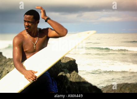Derrick Mayes Football Player with his surfboard Stock Photo - Alamy