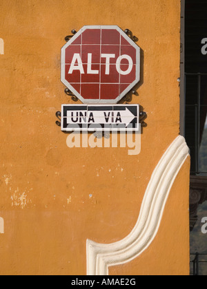 Antigua, Guatemala Stop sign and one way sign made of tile Stock Photo ...