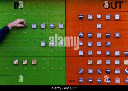 Underground miner checks in at beginning of shift using tag board Stock ...