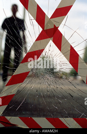 Color image of a broken window on a stone wall Stock Photo - Alamy