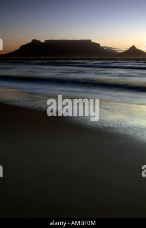 Table Mountain silhouetted during a glorious and dramatic sunset viewed ...