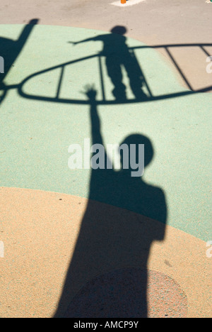 Children climbing over their father on the sofa Stock Photo - Alamy