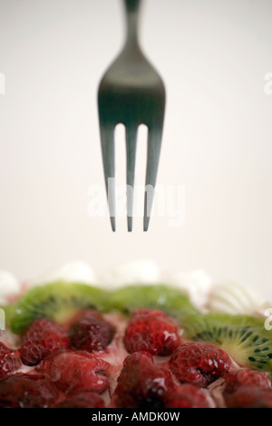 Tucking into cake Stock Photo - Alamy