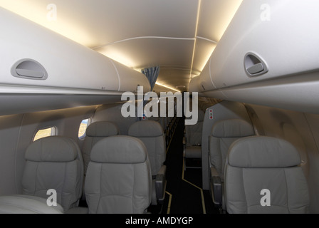 Empty passenger cabin seats of Embraer 170-100STD Stock Photo - Alamy