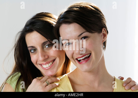 Portrait of two friends smiling Stock Photo - Alamy