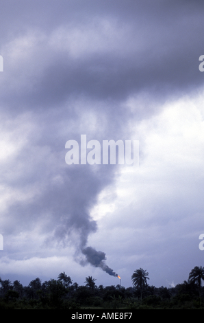 Burning off petroleum gas on a drill ship during oil exploration in the ...