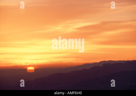 Sun rising over Los Angeles city skyline Stock Photo - Alamy