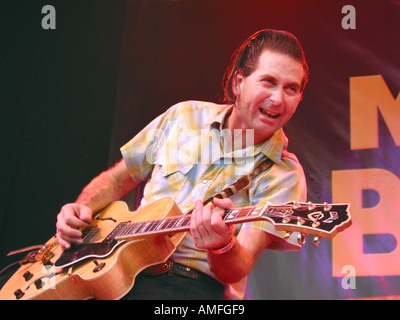 guitarist dave gonzales playing his Guild X550 guitar at Moulin Blues ...