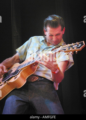 guitarist dave gonzales playing his Guild X550 guitar at Moulin Blues ...