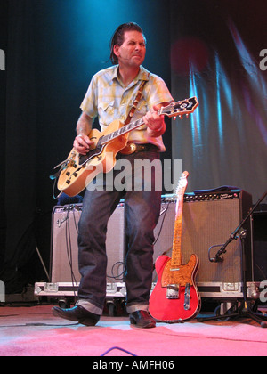 guitarist dave gonzales playing his Guild X550 guitar at Moulin Blues ...