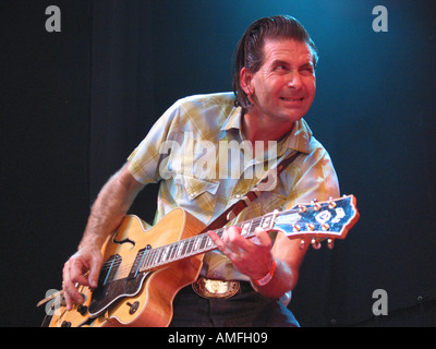 guitarist Dave Gonzales of the Paladins playing his Guild X550 guitar ...