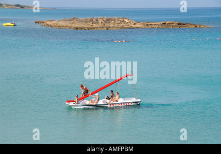 Pedalo with red slide at Fig Tree Bay Protaras on the Mediterranean ...