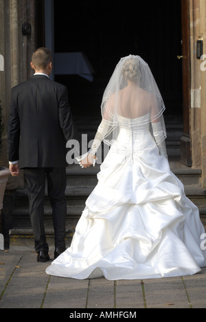 wedding couple at the church Stock Photo - Alamy