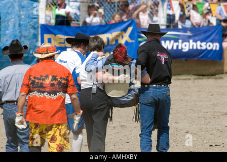 Injured rodeo cowboy Stock Photo - Alamy