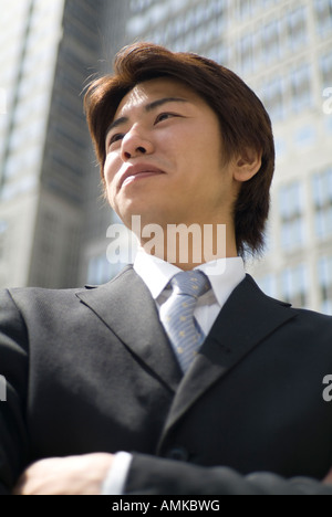 Portrait of a smiling young businessman Stock Photo - Alamy