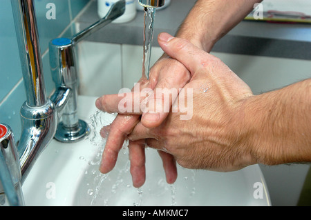MRSA Infection. Doctor or nurse washing hands in UK Hospital Stock ...