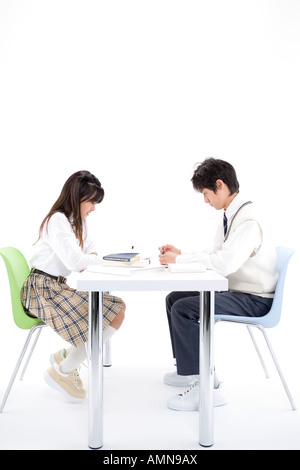 Middle school students studying Stock Photo - Alamy