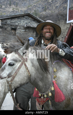 Laughing Nepali cowboy with rasta hairs leather hat and leather jacket ...