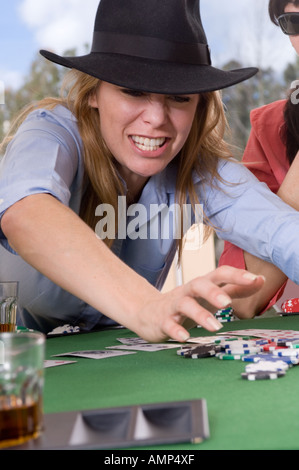 Arguing while playing cards Stock Photo - Alamy