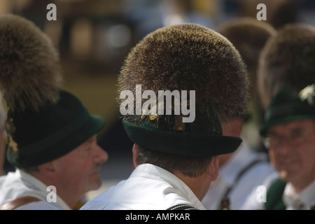 men wearing hat tuft of hair traditionally worn as a decoration Stock ...