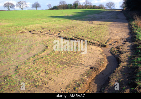 Run off on field causing soil erosion as a result of ploughing downhill ...