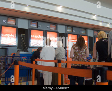 The Easy Jet budget airline check-in desk at Gatwick Airport, London ...