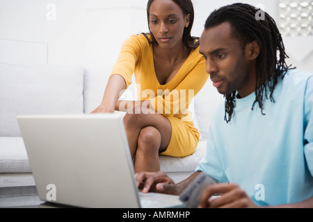 african american couple shopping online Stock Photo - Alamy