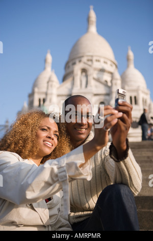 Close up photograph of African black doctor helping African child with ...