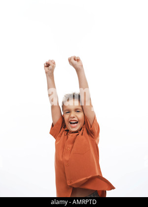 Boy standing alone cheering in a sports stadium Stock Photo - Alamy