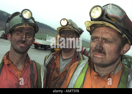 Black faced coal miners after finishing their shift at Tower Colliery ...
