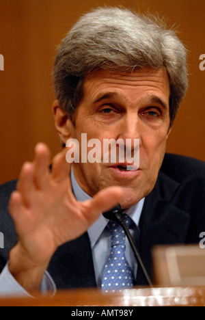Senator John Kerry D MA speaks to Secretary of State Condoleezza Rice ...