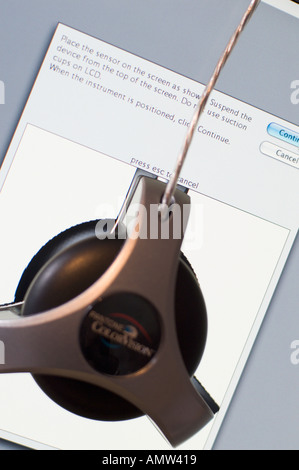 A Pantone Spyder colour calibration device shown on a Formac TFT ...