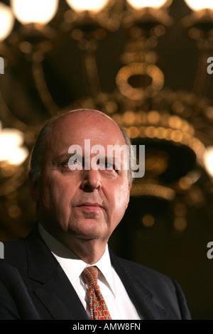 Director of National Intelligence John Negroponte arrives with his wife ...