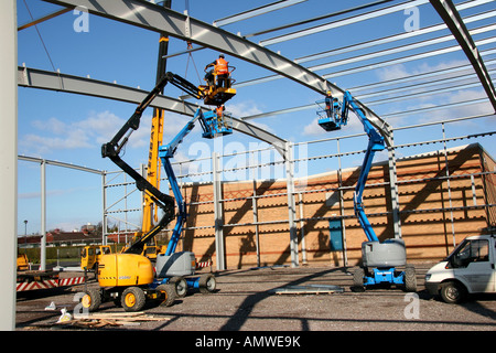 Mobile work platforms on construction site Stock Photo - Alamy