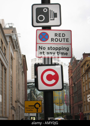 mad traffic road signs in London England UK Stock Photo - Alamy