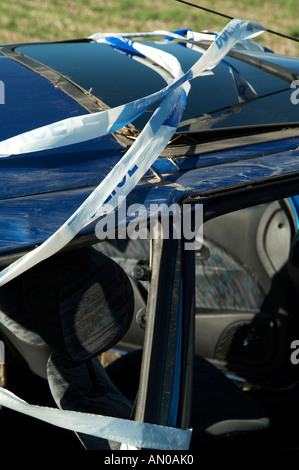 Car crashed with police aware tape all around it, Lulsgate, Bristol ...