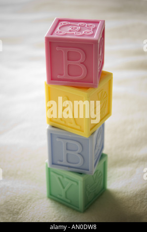 Close up of a stack of alphabet blocks Stock Photo - Alamy