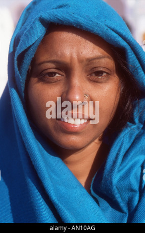 Woman wearing traditional dress outside Royal Tomb of King Michu in ...