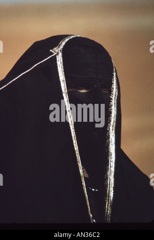 Saudi Arabia. Al Murrah bedouin woman, masked and veiled in traditional ...