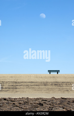 bench on a concrete dike Stock Photo - Alamy