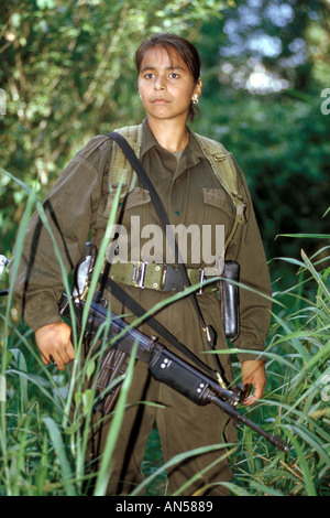 Armed female soldier of the Revolutionary Armed Forces of Colombia FARC ...