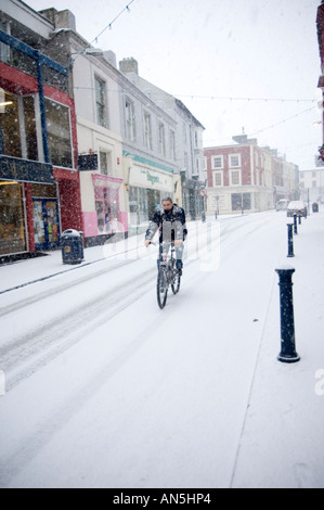 Man cycling at winter Stock Photo - Alamy