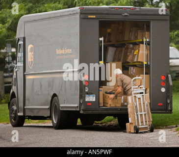 UPS delivery man unloading packages from truck - Washington, DC USA ...